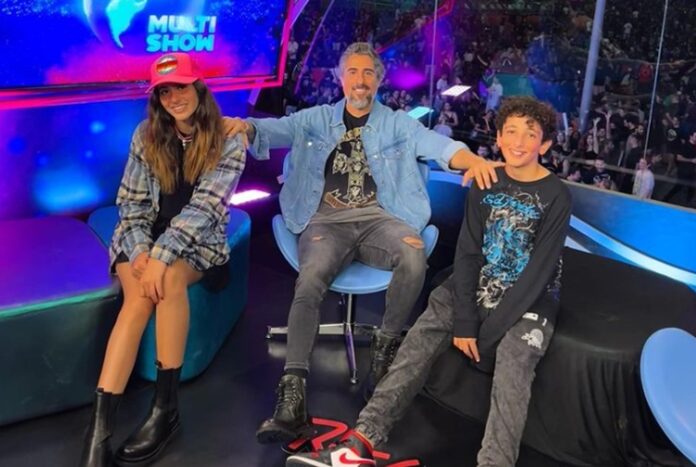 Marcos Mion encanta ao surgir com os filhos no Rock in Rio
